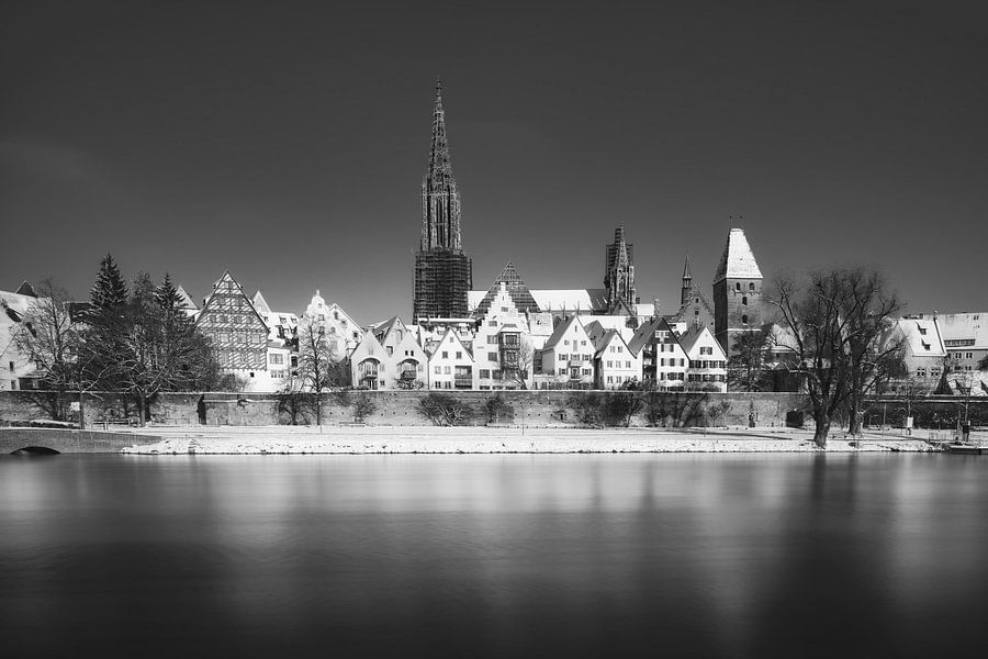 Black and white panorama of the city of Ulm in winter with snow, river ...